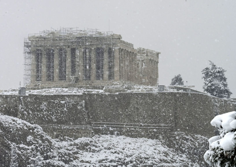 See The Acropolis Covered In Snow After A Rare Storm