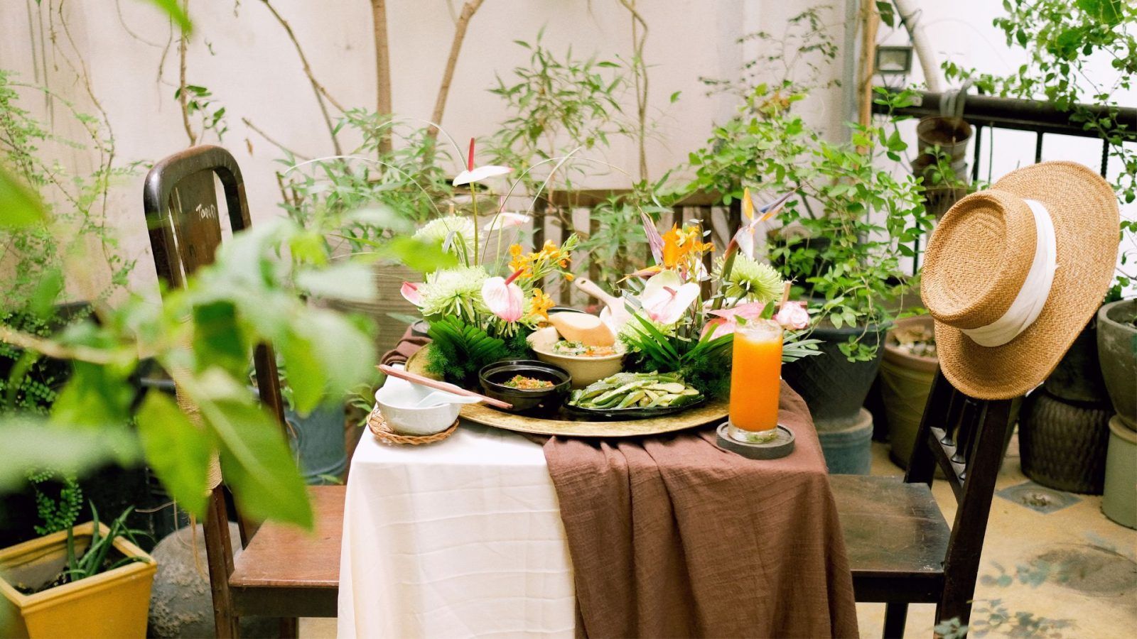 We Can’t Resist the Romance of This Edenic Cafe and Hotel in Vietnam