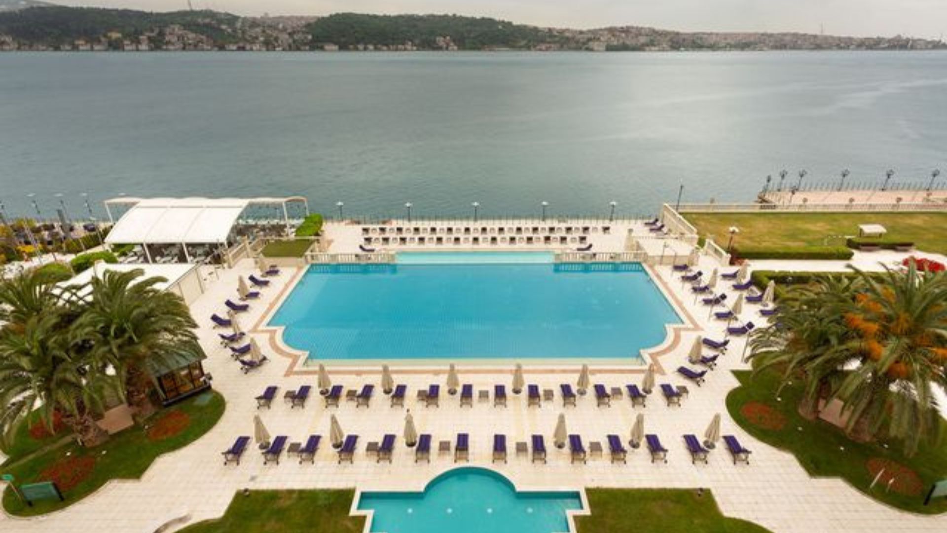 The Best Hotel Pools (And Over-The-Top Suites), According To Experts